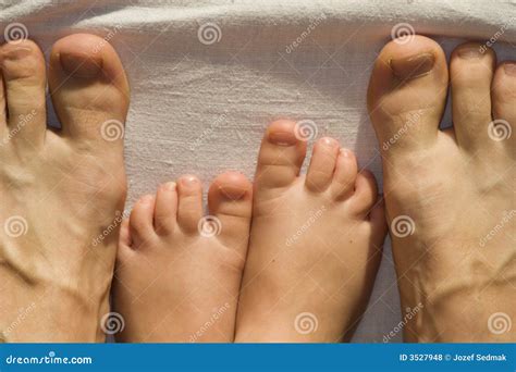 Feet Of Dad And Daughter Royalty Free Stock Photos Image