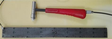 Modal Hammer And Examined Structure With Attached Sensor Download
