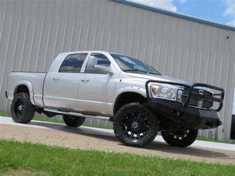 06 Ram 2500 SLT MEGA 5 9L Cummins H O 4X4 Lifted Nitto XD Carfax Bumper