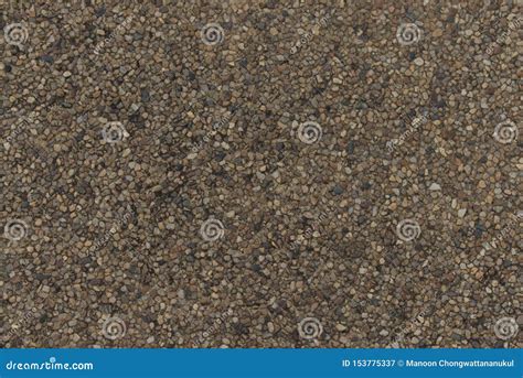 Текстура настила песчаника камешка Sandwash на поле Стоковое