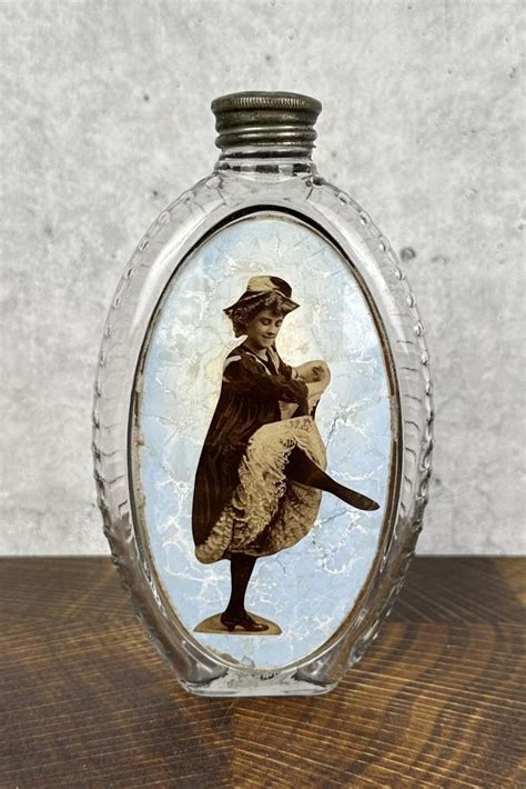 Antique Label Under Glass Risque Whiskey Flask