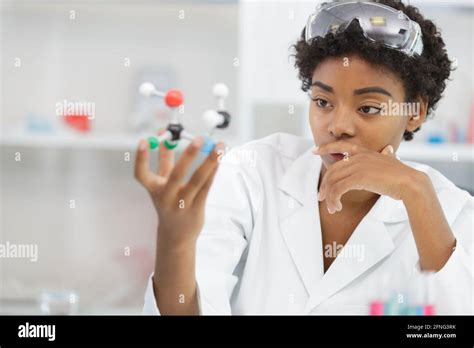 Woman In Lab With Molecular Model Kit Stock Photo Alamy