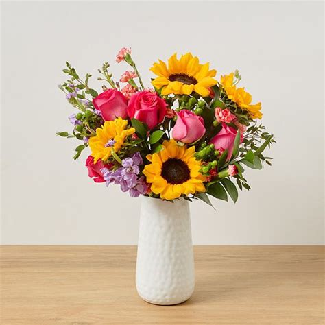 Sunflowers Dark Pink Roses And Berries Mix The Bouqs Co