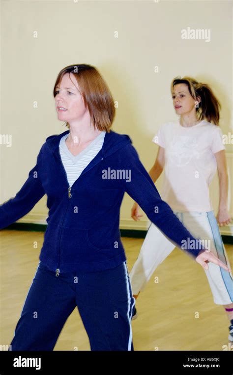 Females Doing Step Exercises In A Workout Class Stock Photo Alamy