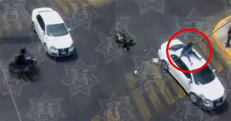 ¡se Salvó Motociclista Termina Sentado En Toldo De Un Auto Tras Choque