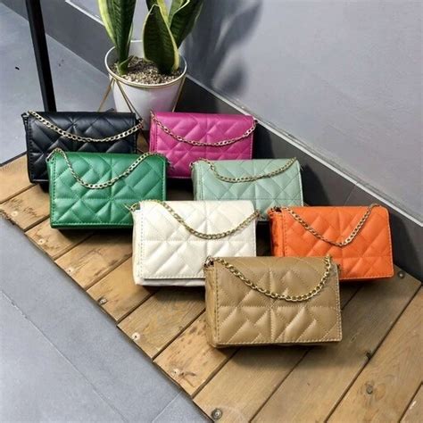 خرید و قیمت کیف دخترانه زنانه چرم زنجیری مستطیلی بند بلند ترب