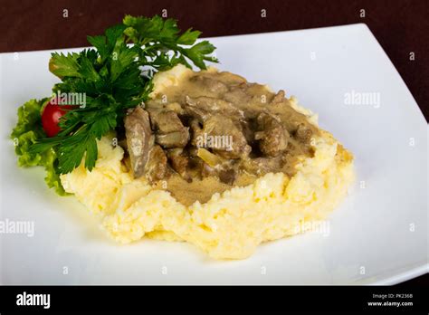 Beef Stroganoff With Mashed Potato Stock Photo Alamy