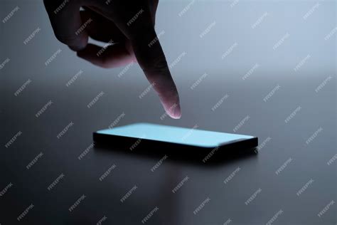 Premium Photo A Human Hand Touching The Screen And Push The Button On