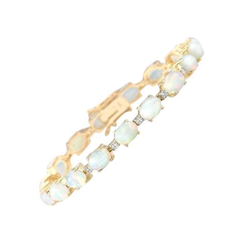17 91 Carat Natural Opal 18 Karat Yellow Gold Diamond Bracelet For Sale
