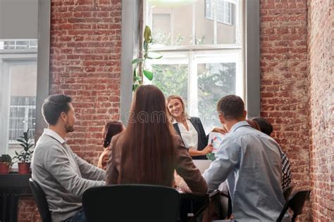 Businesswoman Having Meeting With Her Employees In Office Lady Boss