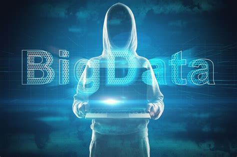 Premium Photo Hacker Holding Laptop With Creative Glowing Coding Big Data Interface On Blue