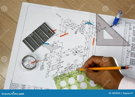 Draftsman At Work Analyzing Documents For Drafting Closeup Of Graph
