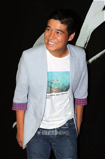 포토 임창정 검게 그을린 피부