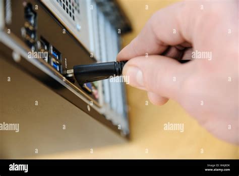 Plugging The Device Hi Res Stock Photography And Images Alamy