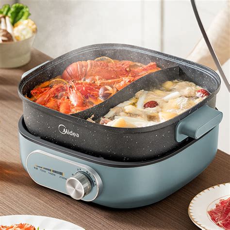 美的 Midea 电煮锅 电火锅鸳鸯分体火锅6l大容量 家用多功能电热锅多用途锅炖煮涮一体mc Hgs303003视频介绍 美的 Midea