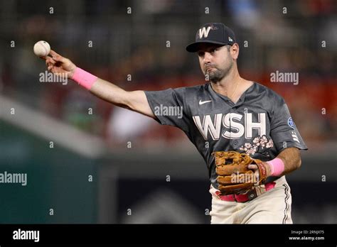 Washington Nationals Second Baseman Jake Alu Throws To First To Put Out