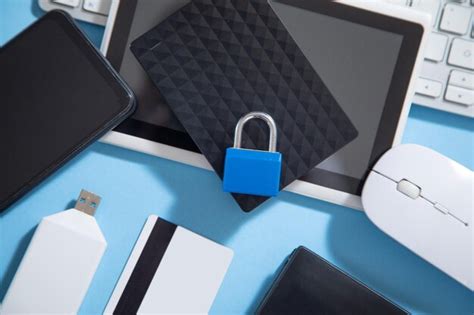 Premium Photo Padlock With A Tablet Keyboard Mouse And Other Device