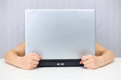 Emotional Woman Hiding Behind A Laptop Portable Unrecognizable Computer Photo Background And