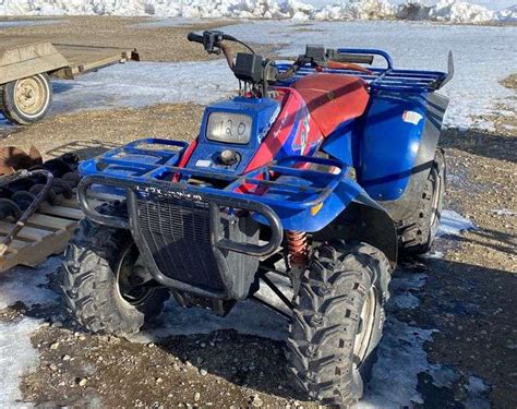 Polaris 2x4 400cc Liquid Cooled Quad 4wd Wild Rose Auction Services