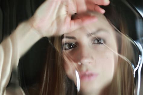 Premium Photo Girl Face Behind Glass