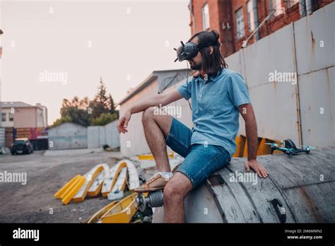 Man Pilot Controlling Quadcopter Drone With Remote Controller Pad Stock