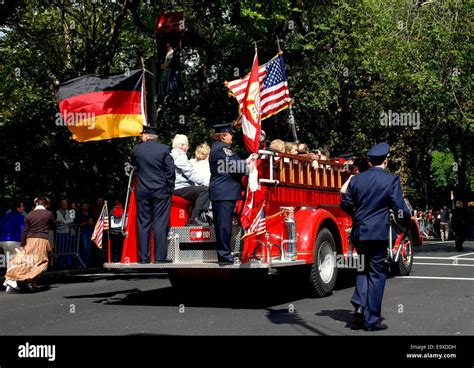Nyc New York City Firefighters With A Firetruck Flying German And