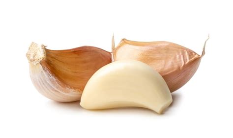 Premium Photo Fresh Garlic Cloves In Stack Are Isolated On White