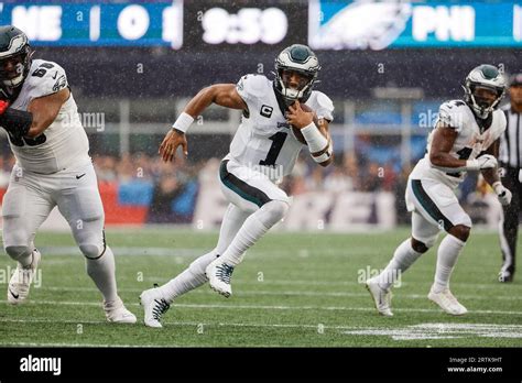 Philadelphia Eagles Quarterback Jalen Hurts Runs In The Rain Against
