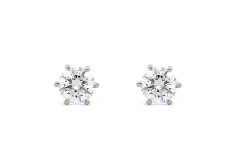 Lot Exquisite 18k Gold Studs Each With 101ct Gia Certified Natural