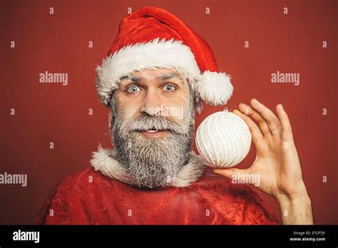 Funny Santa Claus With White Christmas Ball Holiday Decorations And