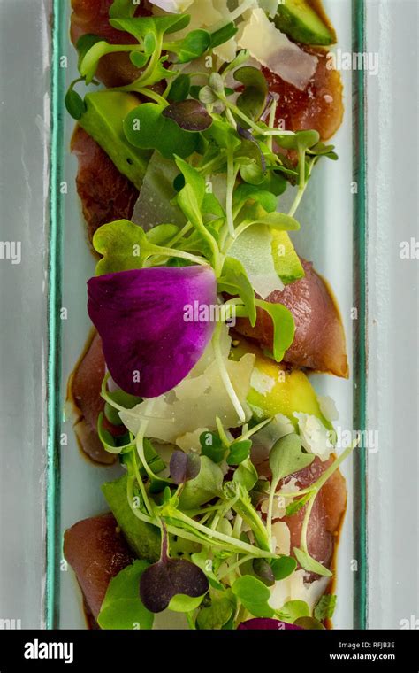 Gourmet Sushi And Seafood Against A Clean White Background Perfect For
