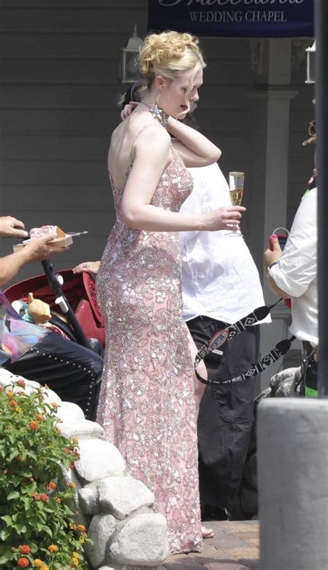 Elle Fanning In A Pink Lace Dress Filming Margos Got Money Troubles At The Graceland Wedding