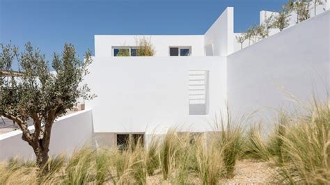 Summer Villa Plays On Santorinis Traditional Whitewashed Houses