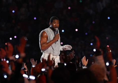 In Photos Usher Dazzles At Super Bowl Halftime Show With Help From His