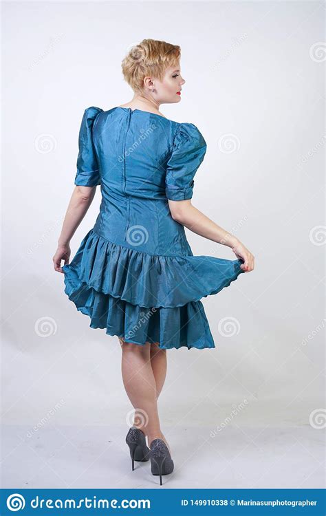 A Beautiful Girl With A Plus Size Figure Dressed In A Cute Retro