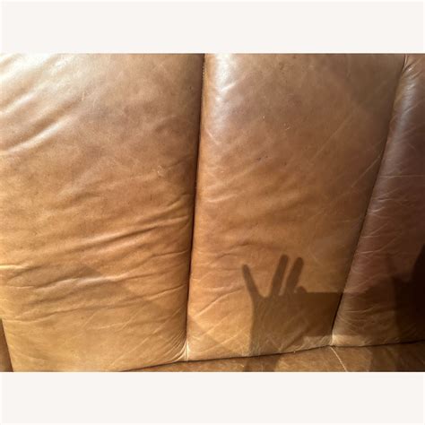 Cb2 Brown Leather Sofa With Brass Base Aptdeco