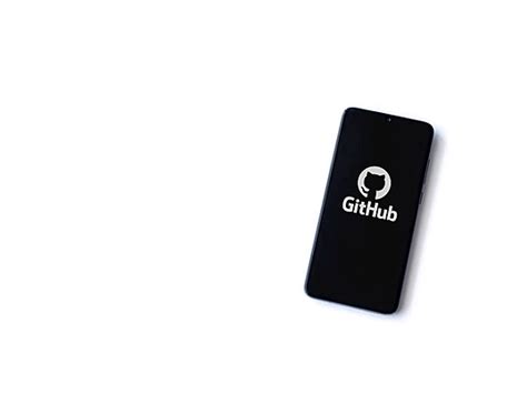 Launch Screen Of Github App Showing Logo On Black Mobile Screen Photo
