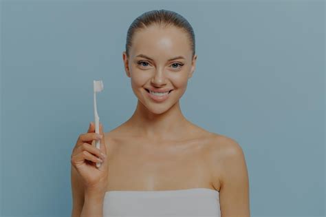 Premium Photo Oral Hygiene Happy Young Woman Brushing Teeth After