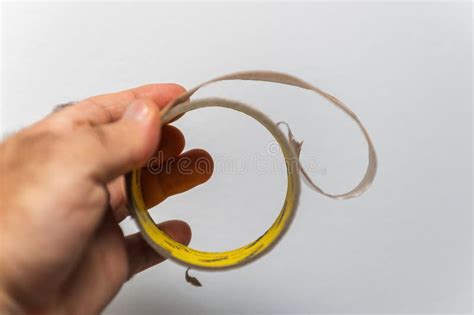 Close Up Of Nearly Empty Scotch Tape Roll In Hand Stock Image Image