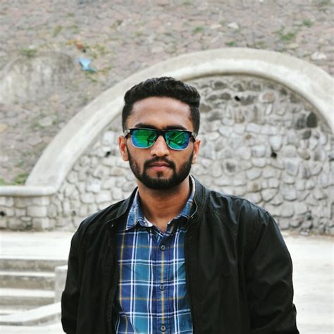 Premium Photo Portrait Of Man Wearing Sunglasses While Standing