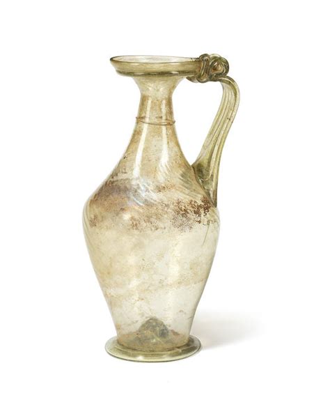 Bonhams A Large Roman Yellow Green Glass Jug
