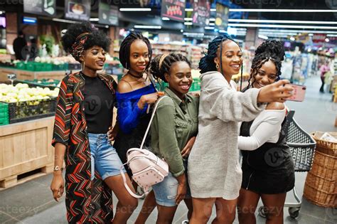 Group Of Five African Womans Making Selfie By Phone At Supermarket