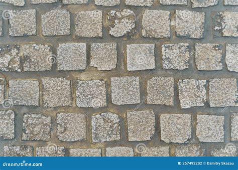 The Texture Of The Stone Pavement Granite Square Cobblestone Pavement