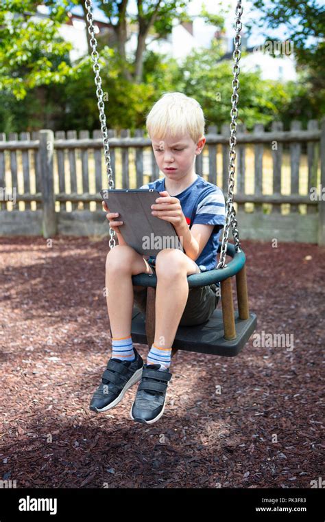 Children using iPad and iPhone Stock Photo - Alamy