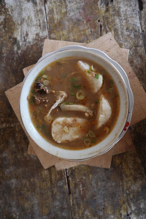 Coto Makassar Food From Indonesia With Some Meat And Lontong 13055878