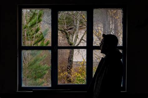 Premium Photo A Dramatic Silhouette Of Man Captured From Behind In A