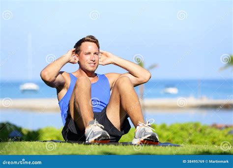 Man Exercising Sit Ups Outside Stock Image Image Of Muscle Muscular