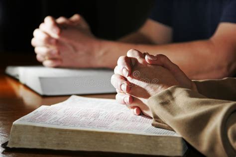 Man And Woman Praying With Holy Bibles Stock Image Image Of Female Prayer