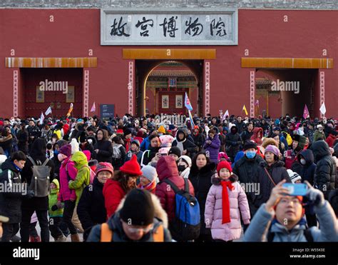 tourists crowd the palace museum also known as the forbidden city