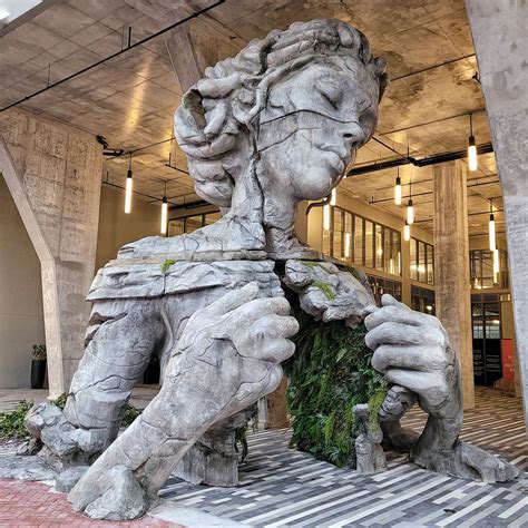 A Monumental Figure Reveals A Fern Canopied Tunnel Inside Its Chest In Sculpture By Daniel